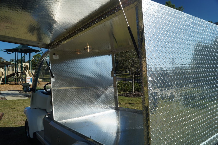 Buddy LSV Two-Passenger Enclosed Electric Utility Cart | Moto Electric ...